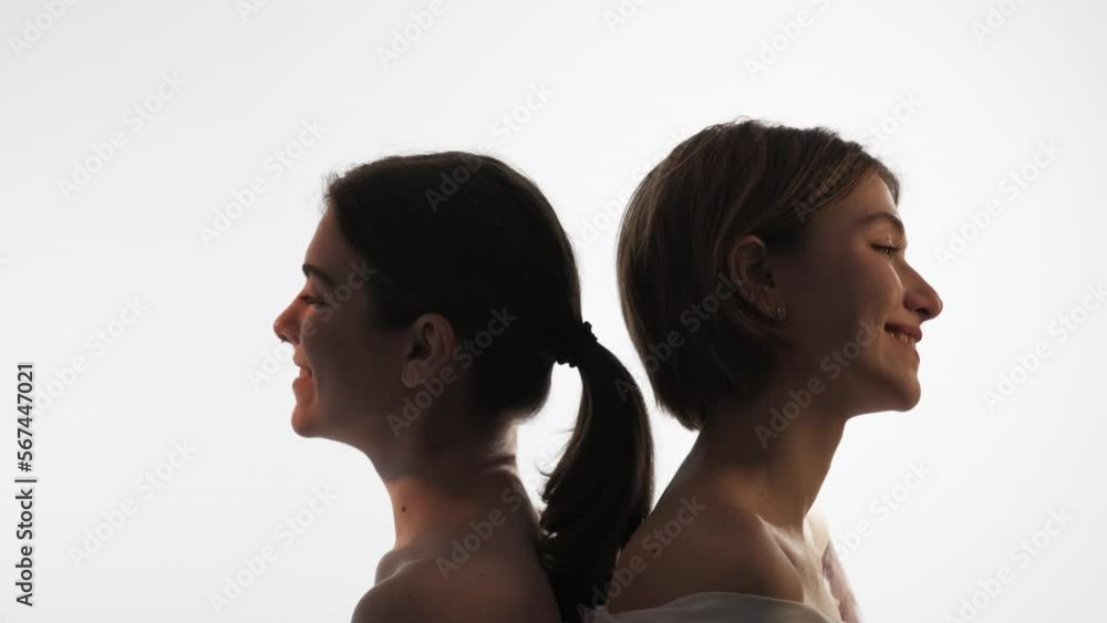 Happy women. Silhouette profile portrait. Smiling female friends bare ...