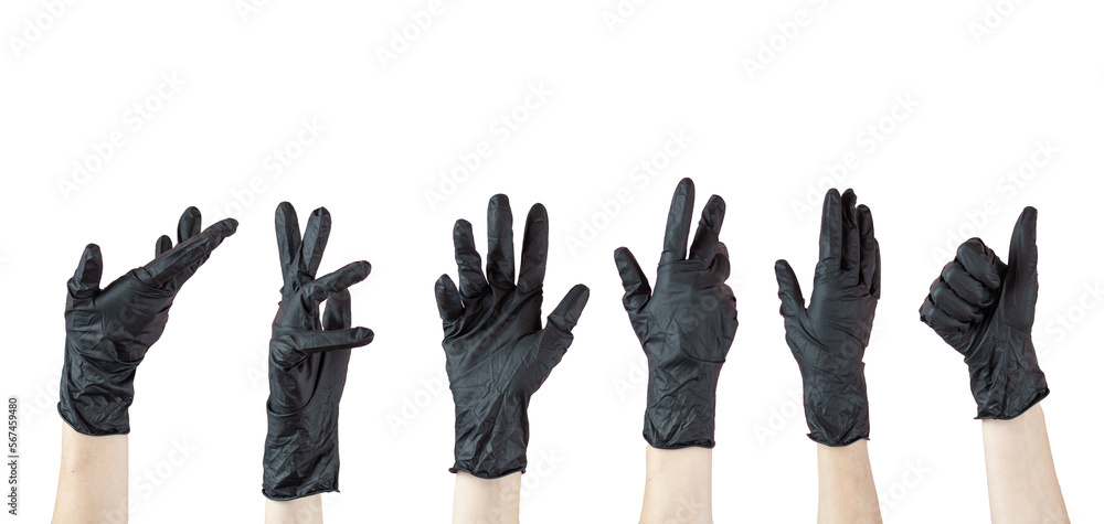 A hand with a black rubber glove shows various gestures on a ...