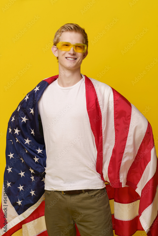 Super American Hero Concept. Youth Smiles in a White T-shirt and the ...