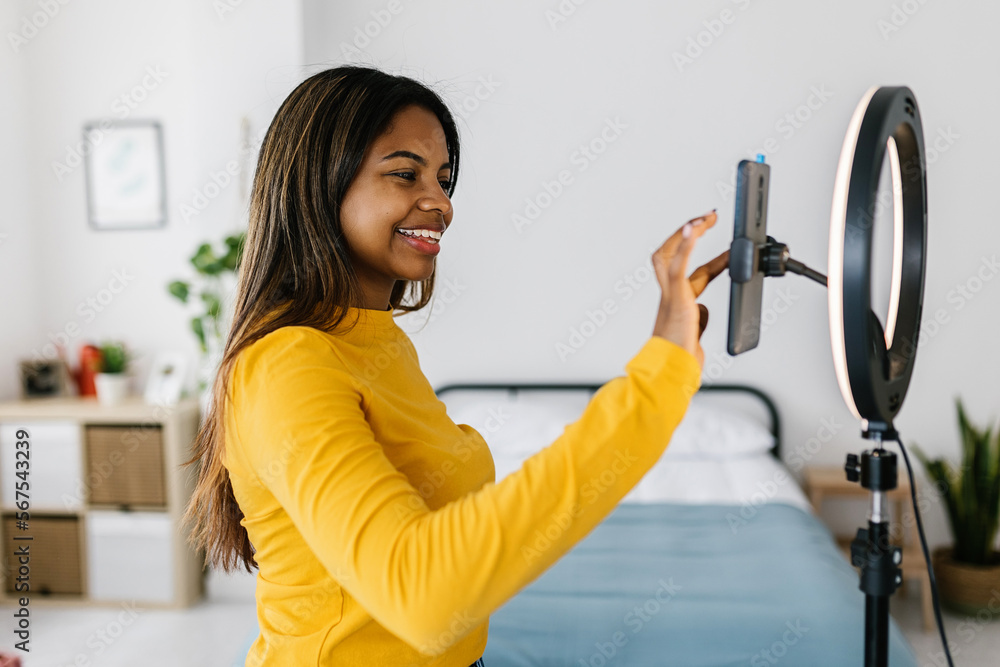 Young Millennial Teenage Girl Using Mobile Phone Camera App To Record Video Reel For Social