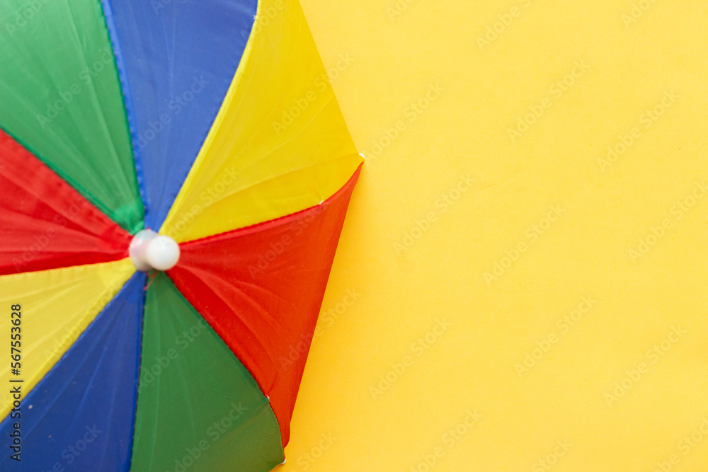 carnival parasol on the yellow background Stock Photo | Adobe Stock