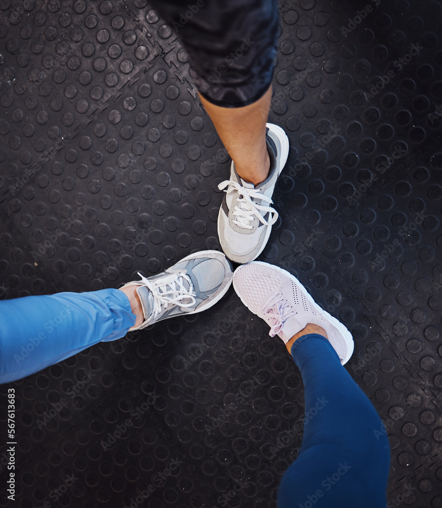 Women, gym and shoes on floor in circle for teamwork, motivation and ...