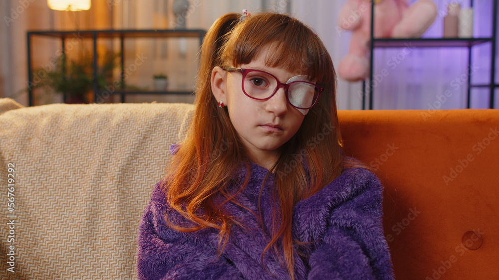 Sick ill preteen girl looking at camera, having protective bandage ...