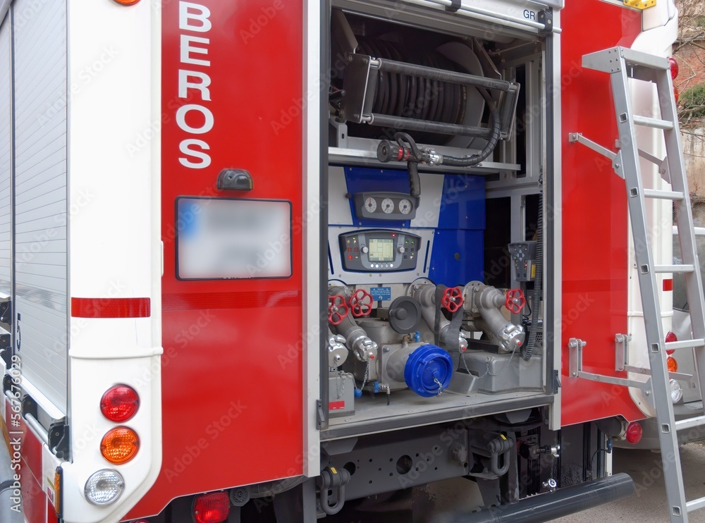 rear of a fire truck with its operating mechanism for the water pump in ...