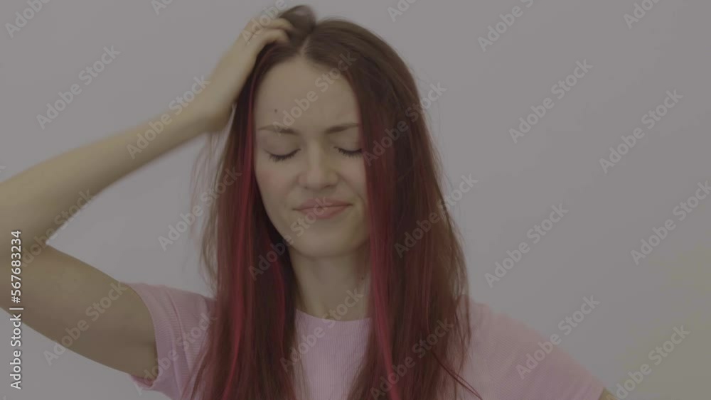 Woman scratching her scalp caused of itchy scalp. Dandruff and an ...