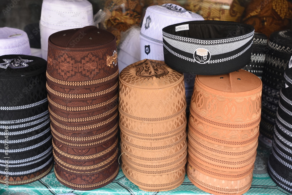 A collection of hats, decorative Islamic headdresses that are usually ...
