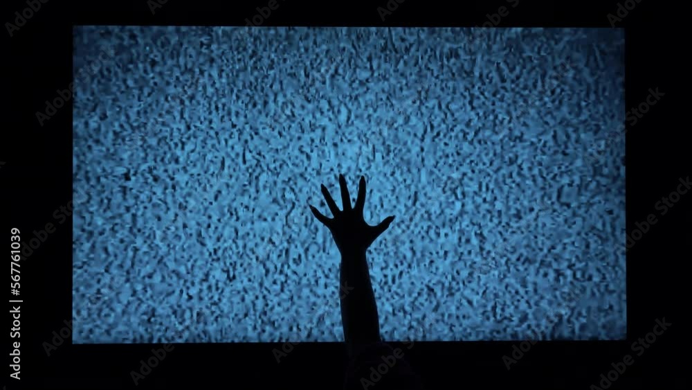 Hands on the background of the noise of the TV scary scene for a horror ...