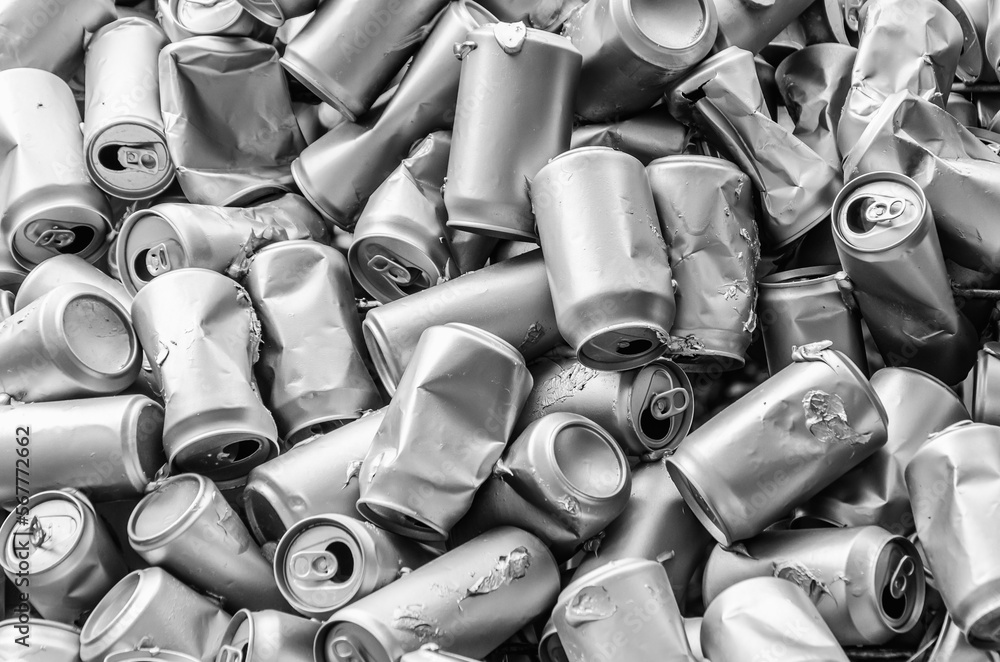 bunch of crumpled empty aluminum cans. concept of processed waste ...