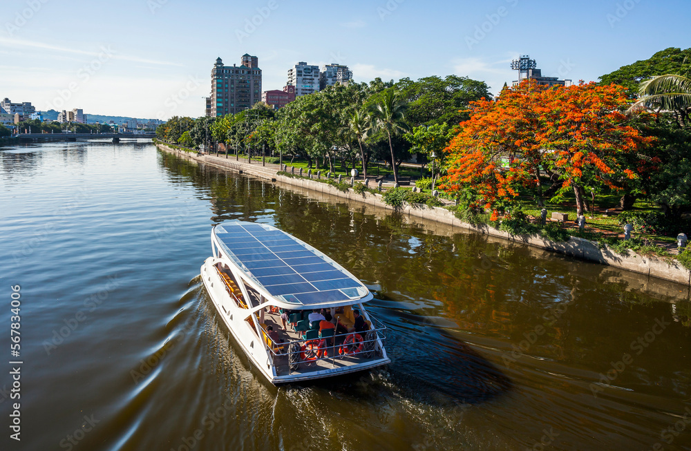 The solar-powered ferry is sailing in the Love River in Kaohsiung ...
