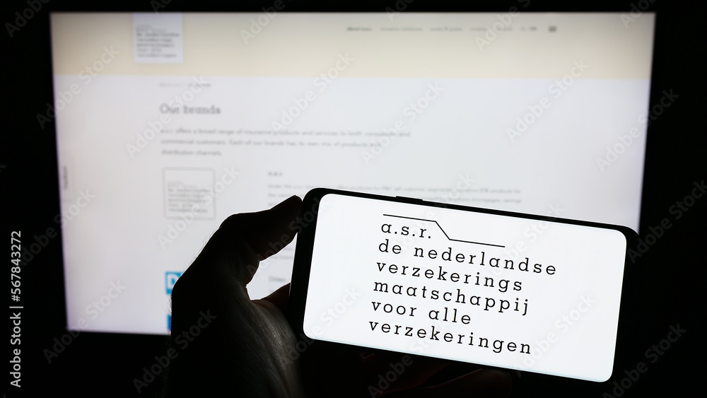 Stuttgart, Germany - 01-29-2023: Person holding mobile phone with logo ...