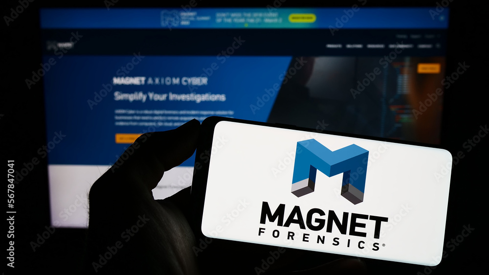 Stuttgart, Germany - 01-30-2023: Person holding mobile phone with logo ...