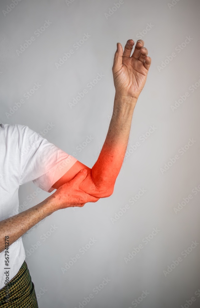 Pain in the arm of Asian old man. Concept of elbow and forearm pain ...