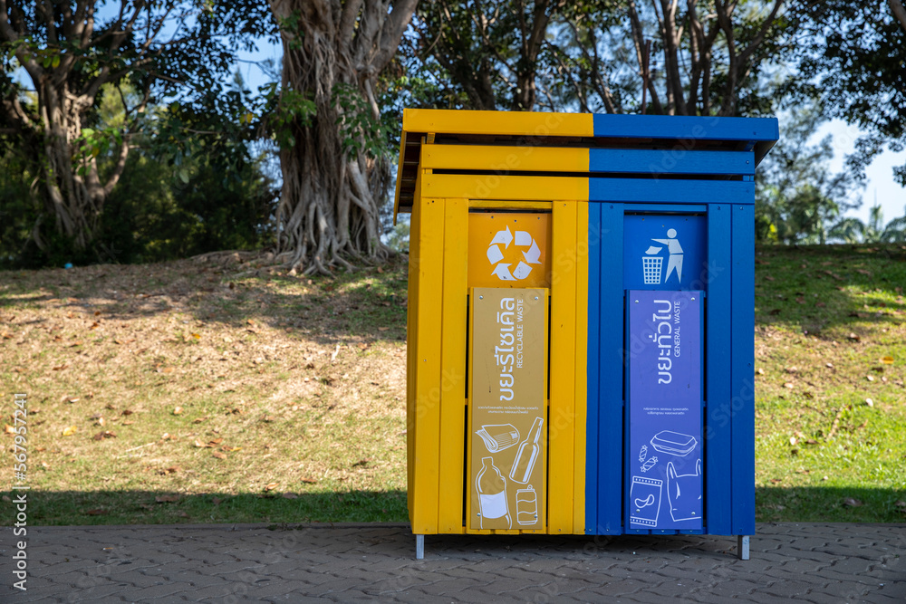 Recycling bins in the park. Outdoor garbage containers for plastic ...