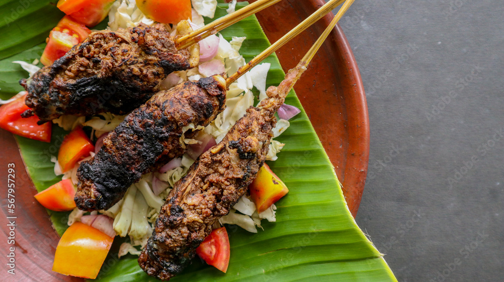 sate buntel or satay buntel is satay made from minced mutton wrapped in ...