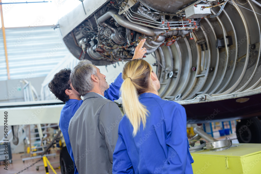 checking the parts of an aircraft Stock Photo | Adobe Stock