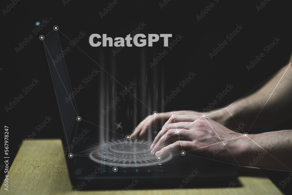 ChatGPT hologram on PC keyboard typing. ChatGPT is a chatbot launched ...