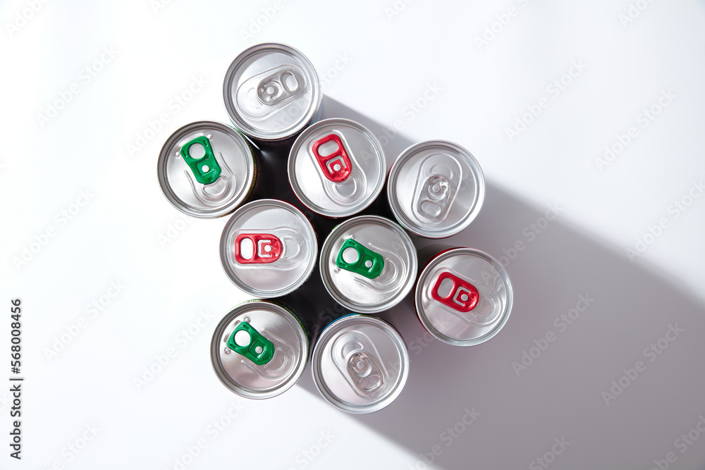 Colorful Drink Cans On white background, top view, hard light shadows ...