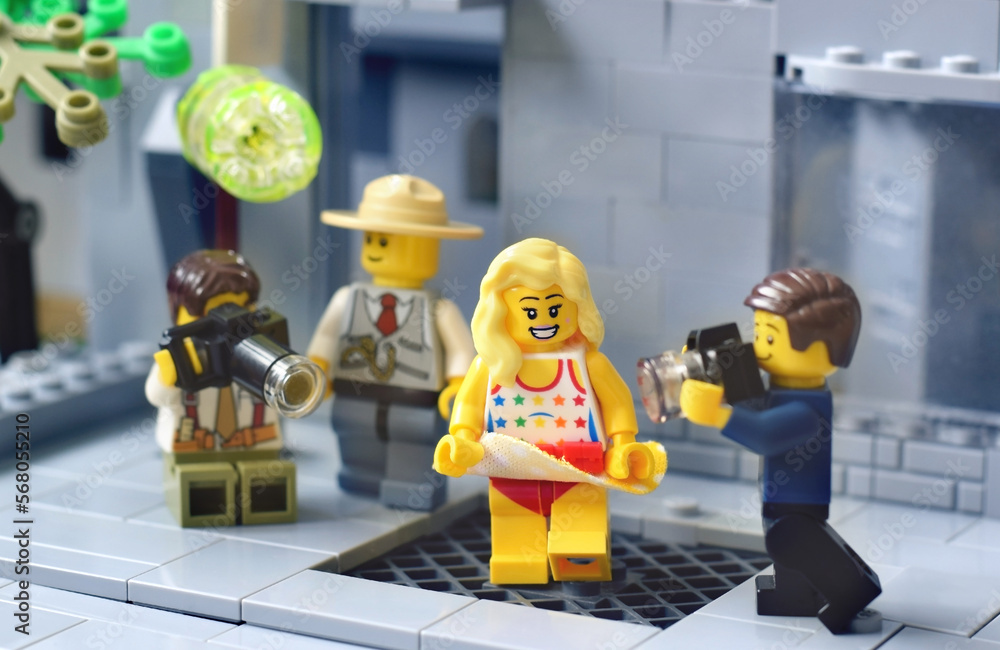 Lego minifigure of actress like Marilyn Monroe over a subway grate. A ...