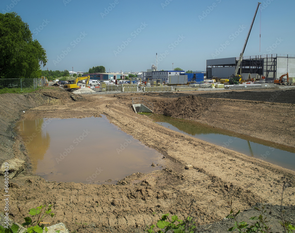 Large construction site: modern factory being built on site of former ...