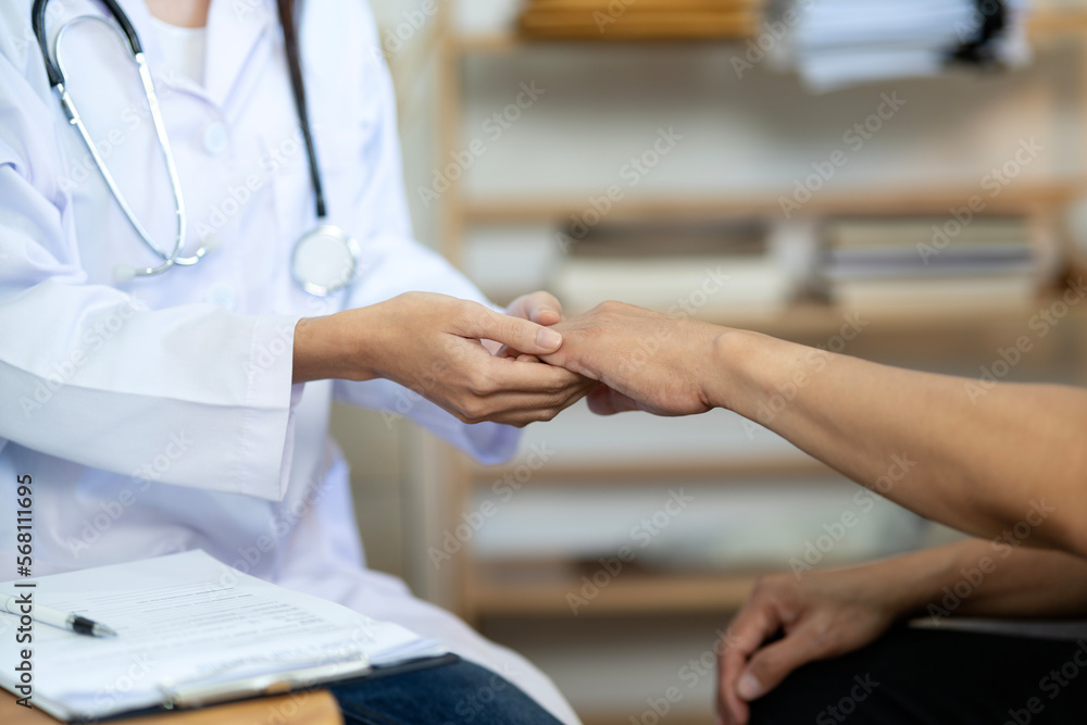 young asians doctor is holding hands to console and mentor discouraged ...