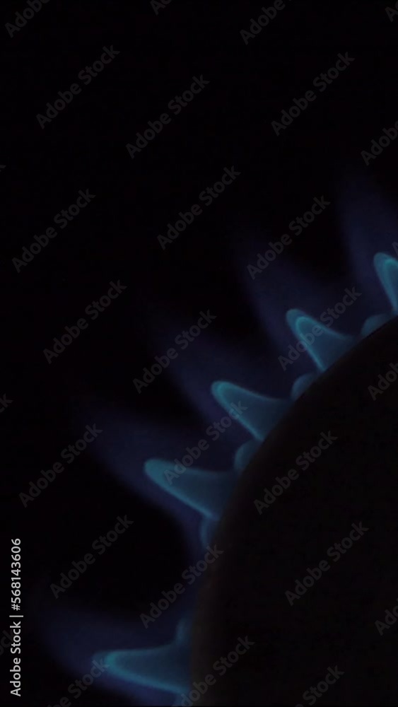 Vertical Screen: Gas switch on and lit on the Kitchen Stove appearing ...