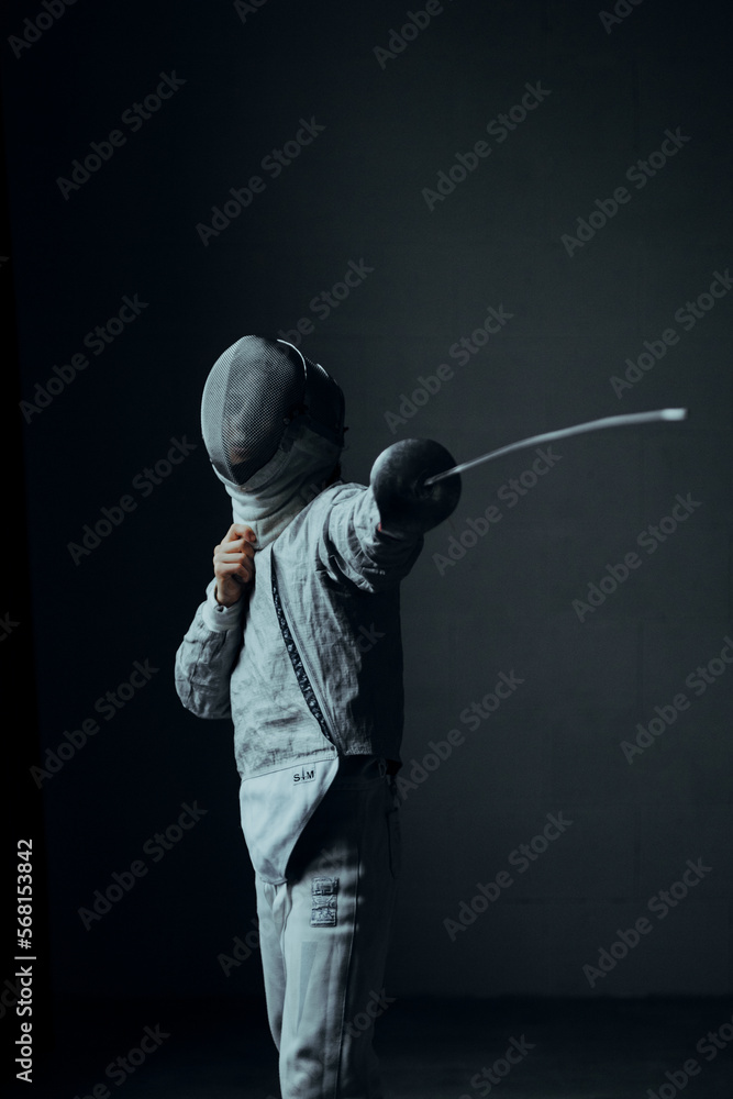 beautiful man fencer with a foil rapier sword Stock Photo | Adobe Stock