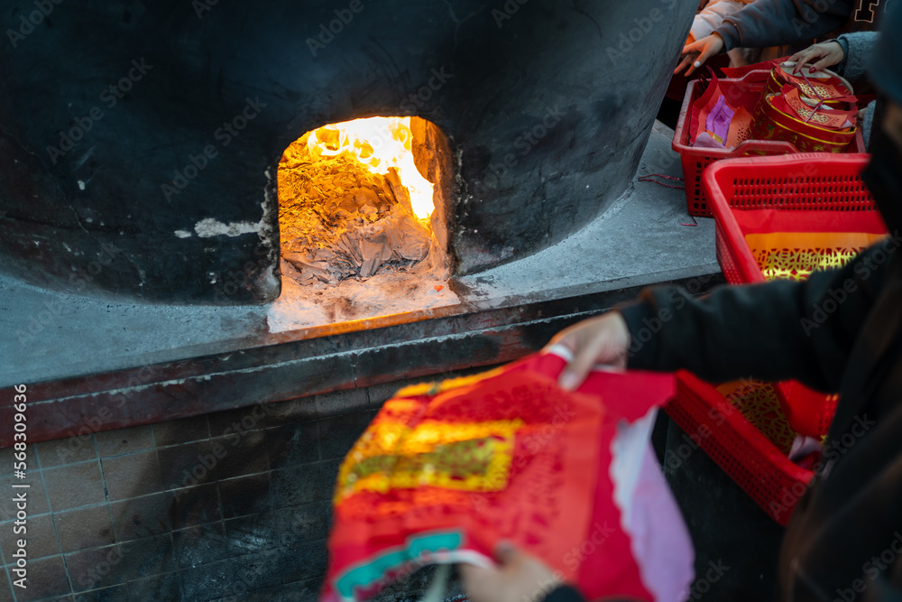 burn Chinese paper sacrificial offering Stock Photo | Adobe Stock