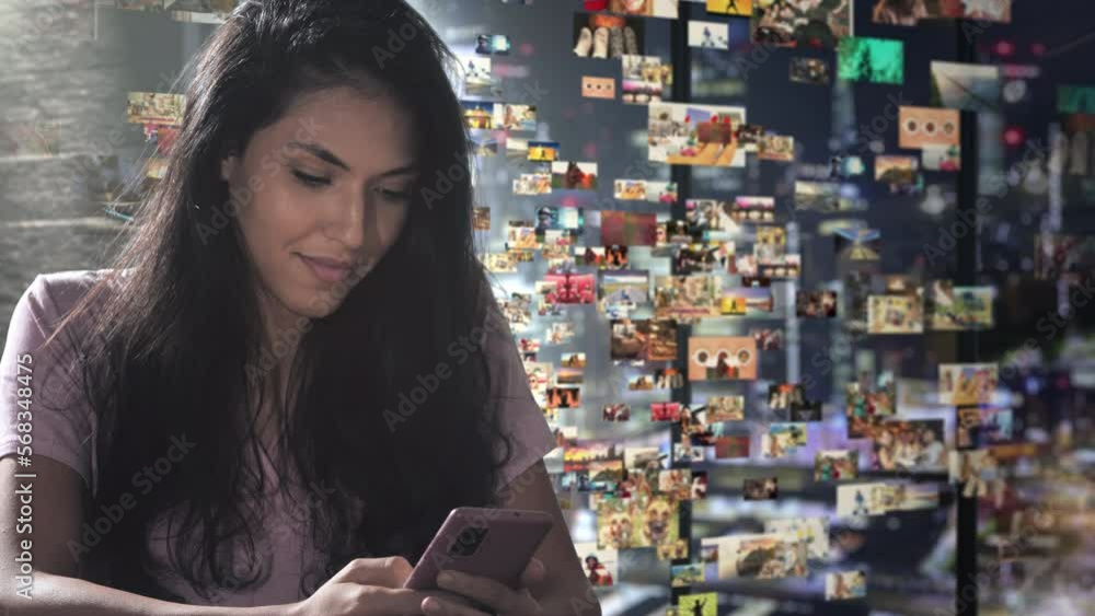 Young woman uses smartphone browsing social media content,front view of ...