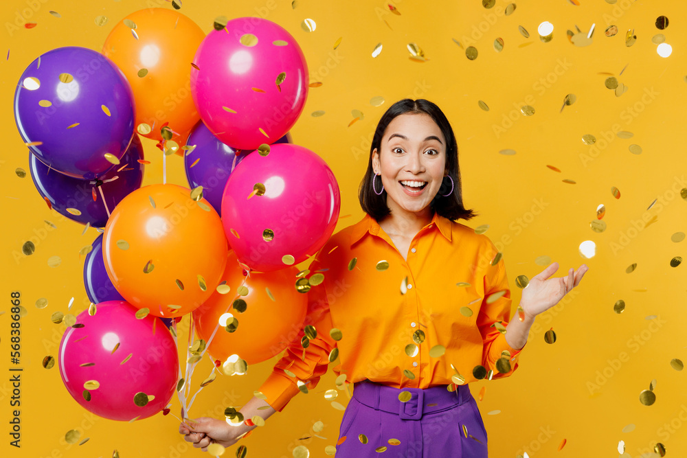 Foto de Happy fun young surprised fun woman wearing casual clothes ...