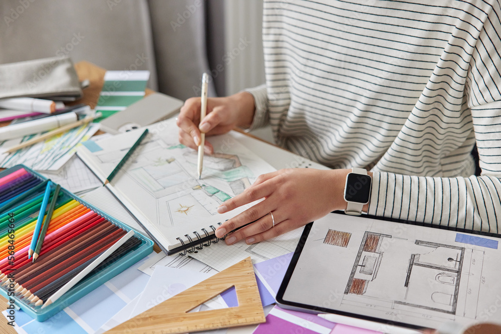 Home decor and sketching concept. Unrecognizable person draws room ...