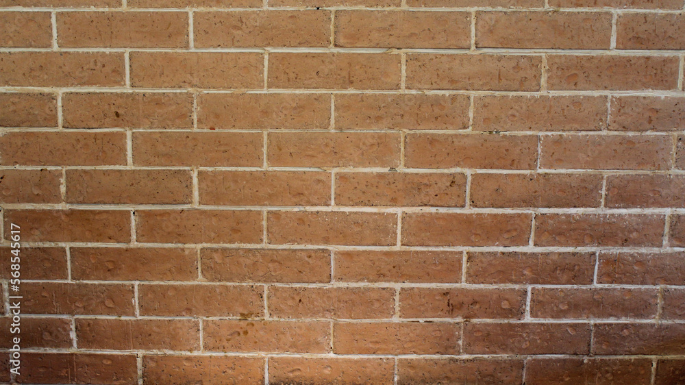 Foto de Muro de ladrillo quemado color cafe. do Stock | Adobe Stock