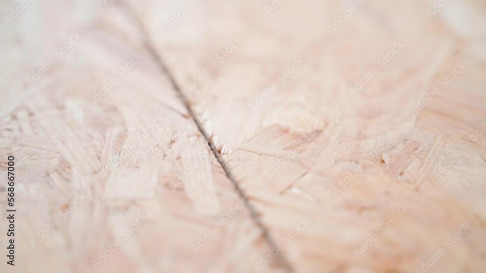 Joint of two oriented strand boards close-up. Draft floor from osb ...