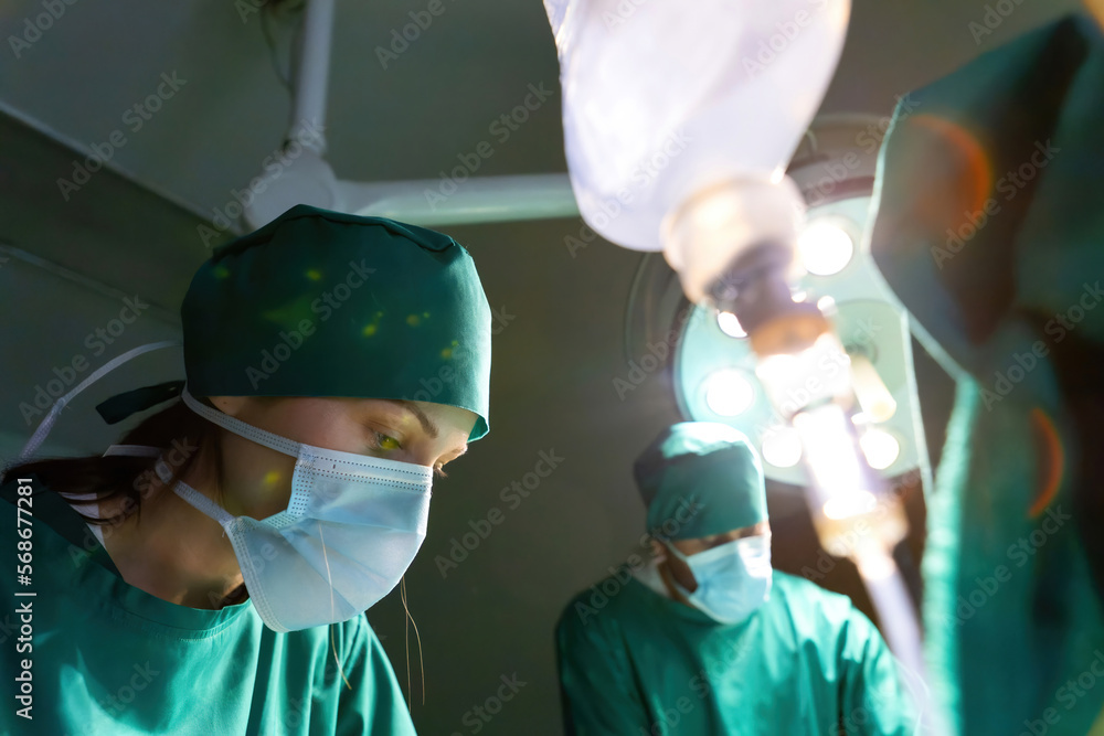 doctor putting medical tape tube patient for infusion operation. expert ...