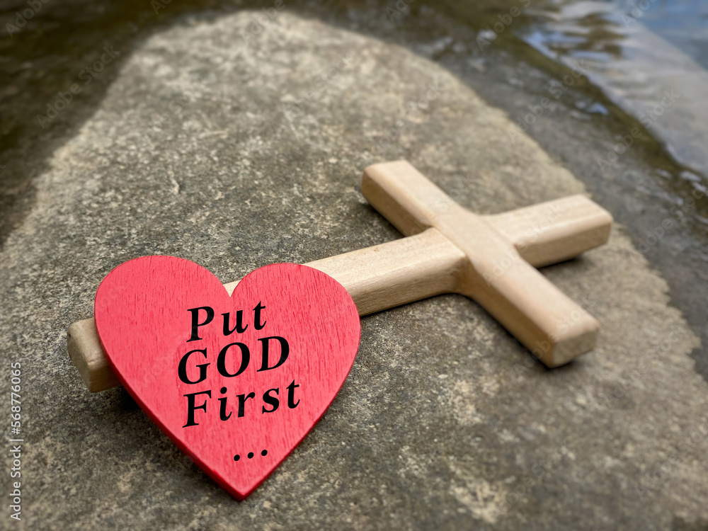 Religion Concept - put GOD first text on red heart shaped background ...