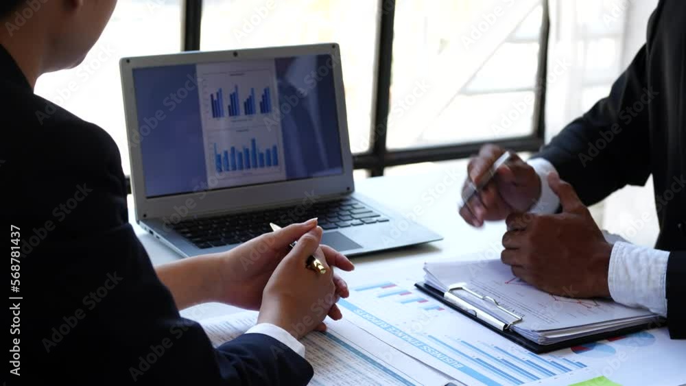 Accounting team manager working with cash flow chart and balance sheet ...