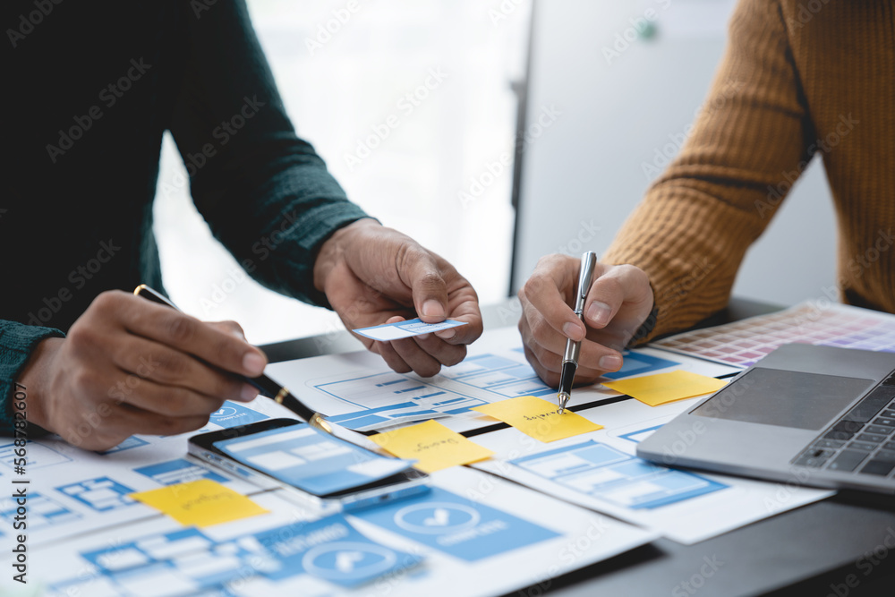 Ux Developers Ui Designers Asian Group Data Researchers Brainstorm On Tabletop Mobile App