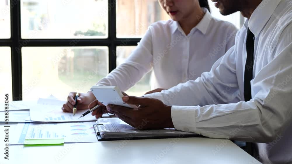 Accounting team manager working with cash flow chart and balance sheet ...