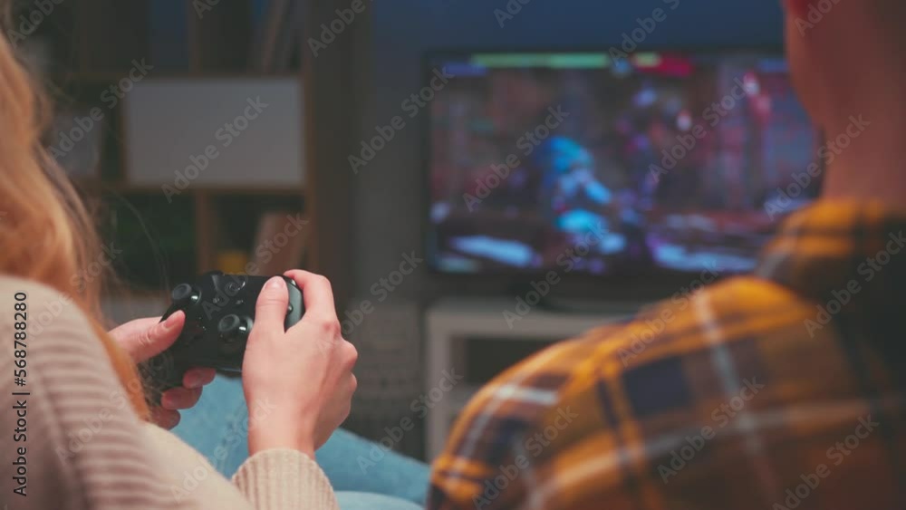 People Playing Video Game on Console Xbox Controllers Indoors Close-Up ...