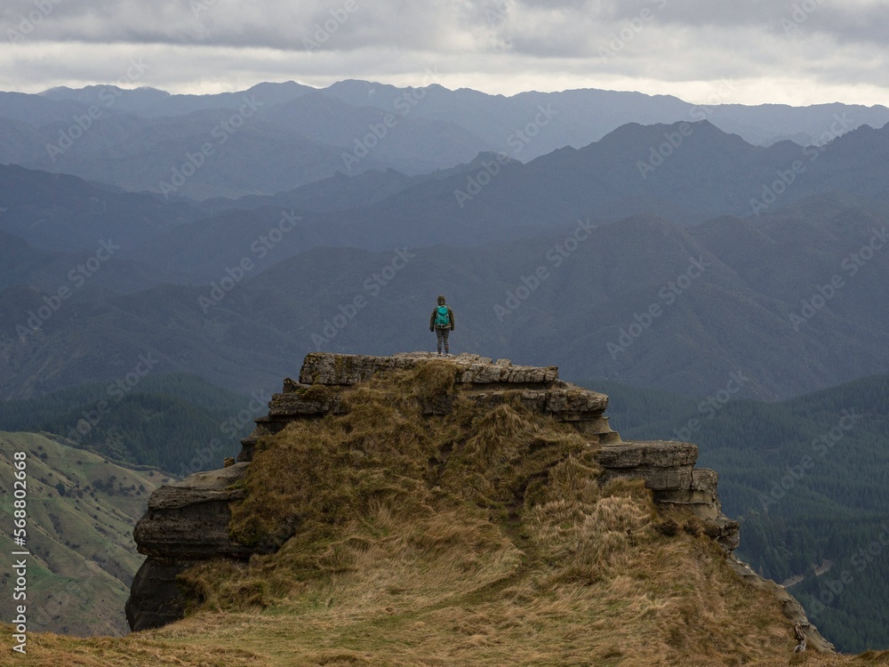 Lone hiker enjoying backcountry nature landscape mountain panorama at ...