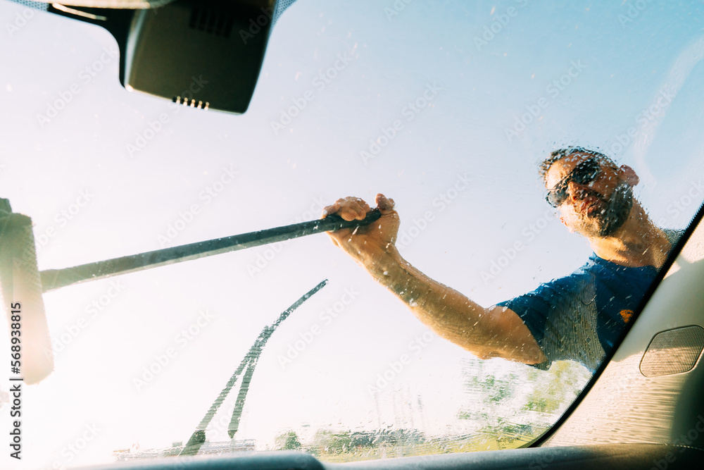 Watermarks causing distortions on a car windshield. Stock Photo | Adobe ...