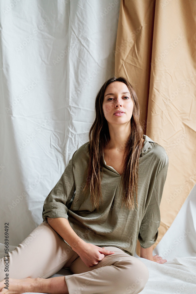 Beautiful woman posing without makeup in studio. Stock Photo | Adobe Stock