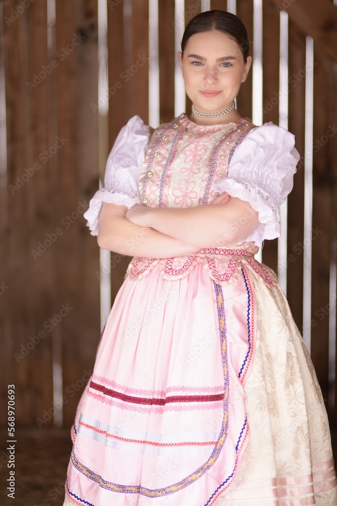 Young beautiful slovak woman in traditional dress. Slovak folklore ...