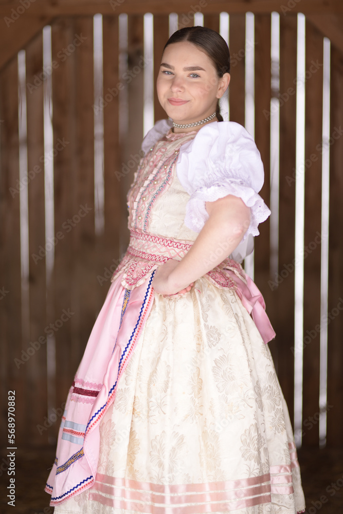 Young beautiful slovak woman in traditional dress. Slovak folklore ...