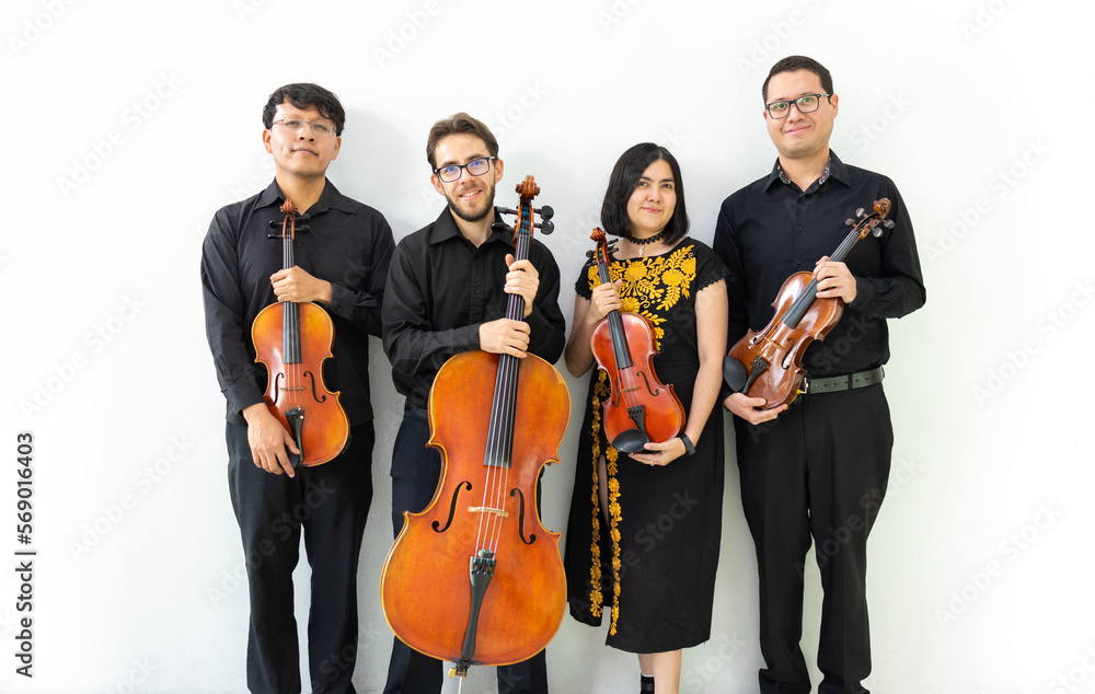 multiethnic group of musicians, string quartet posing for camera not ...