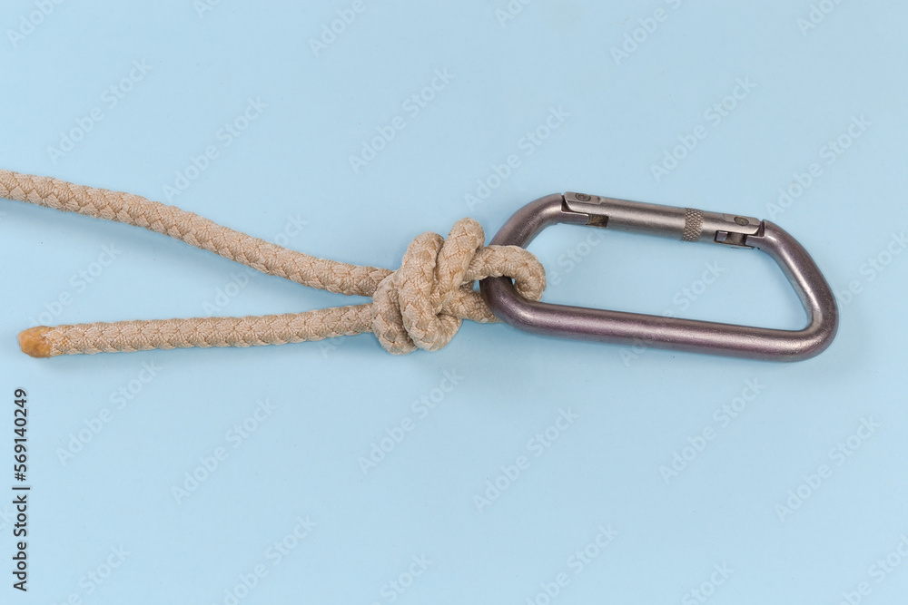 Rope knot Double overhand noose tied to a carabiner Stock Photo | Adobe ...