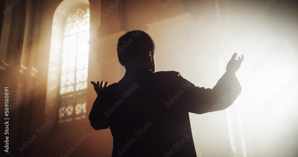 Portrait of Christian Priest Raising Hands In Blessing His Congregation ...