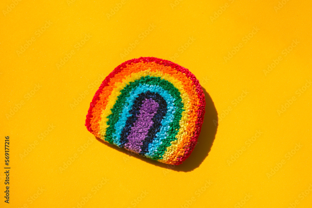 Fluffy rainbow embroidered in punch needle technique in hard lig Stock ...