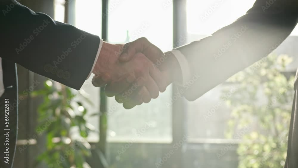 Close-up male office corporate handshaking. Two unrecognizable men ...