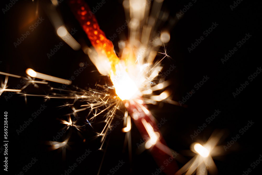 out-of-focus Lightening sparkler on the black background. Sparkler ...