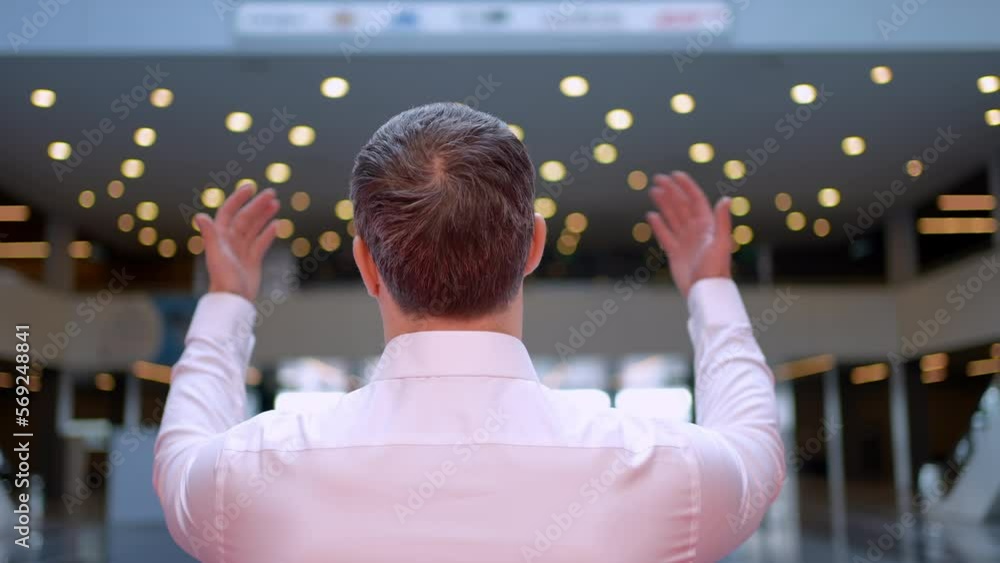 Speaker man seminar audience speak in microphone. Forum speaking. Rear ...